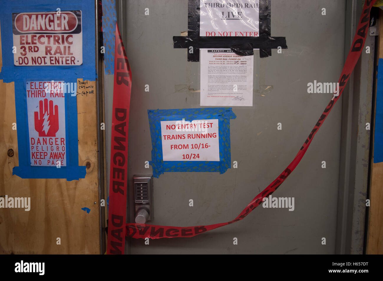 New York, NY, USA. 18th Oct, 2016. A door with sings alerting to the ...