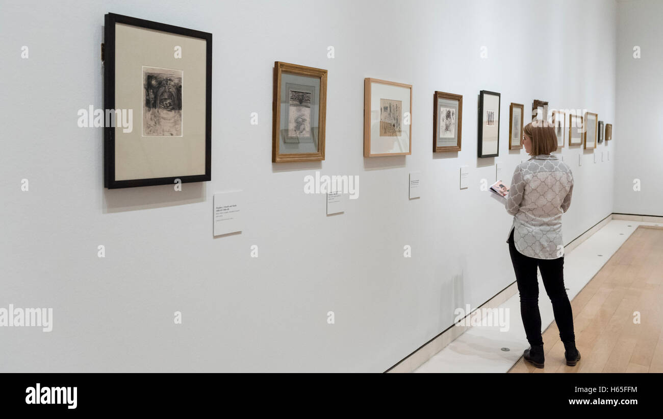 London, UK. 25 October 2016. A staff member catalogs works at the ...
