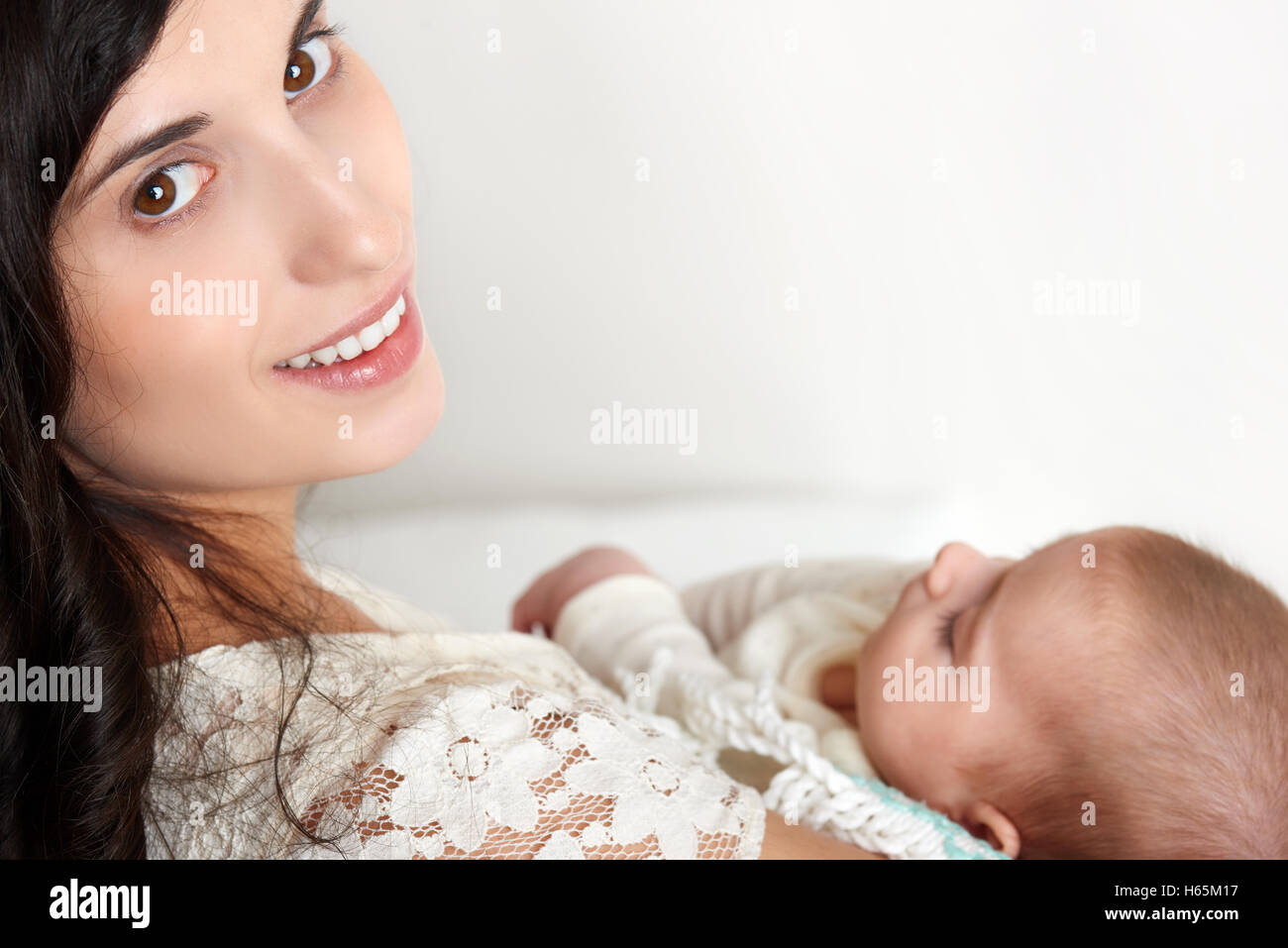 mother with baby on hand portrait, happy maternity concept Stock Photo ...