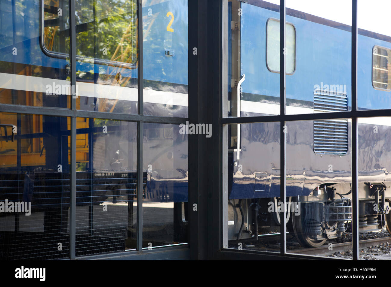 Detail of a train leaving arriving a railway station. Horizontal Stock ...