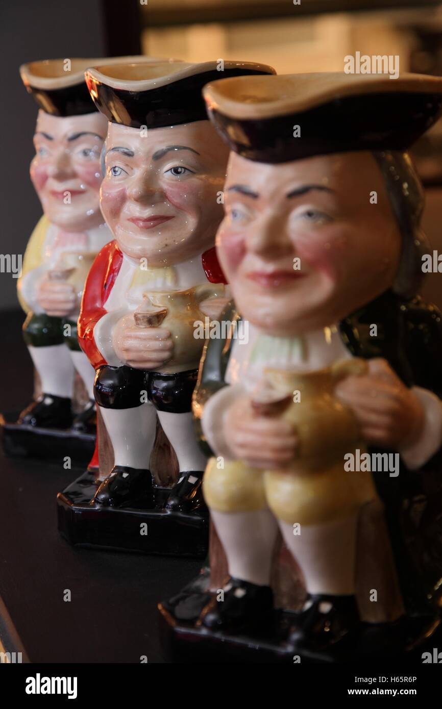 A row of three Toby Jugs on a shelf Stock Photo - Alamy