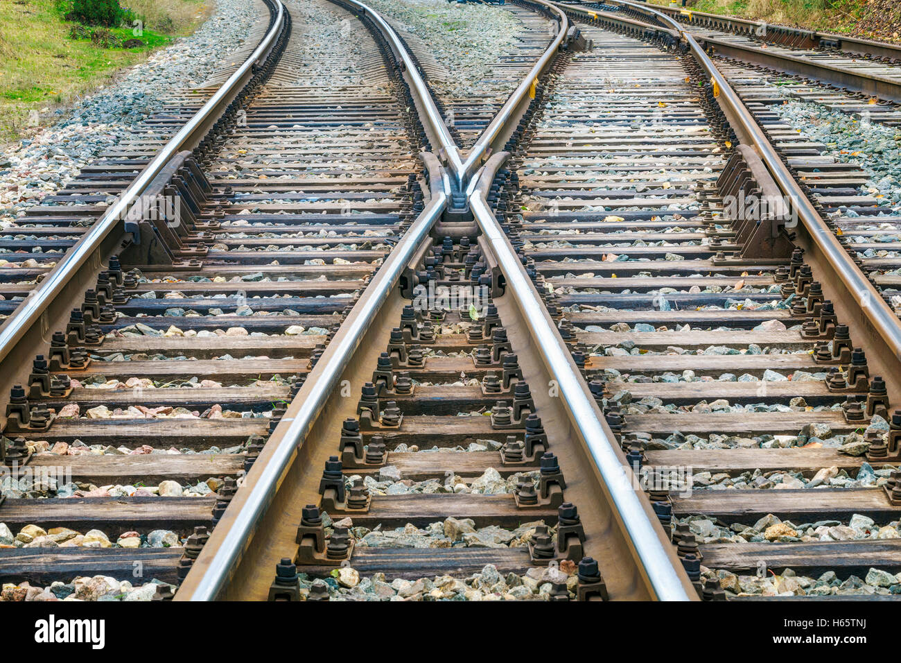 Railway track lines before the rail station Stock Photo - Alamy
