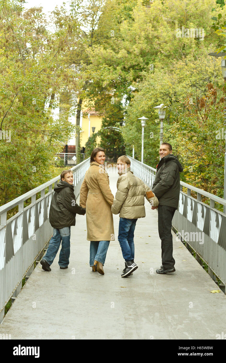 Happy family walking Stock Photo - Alamy