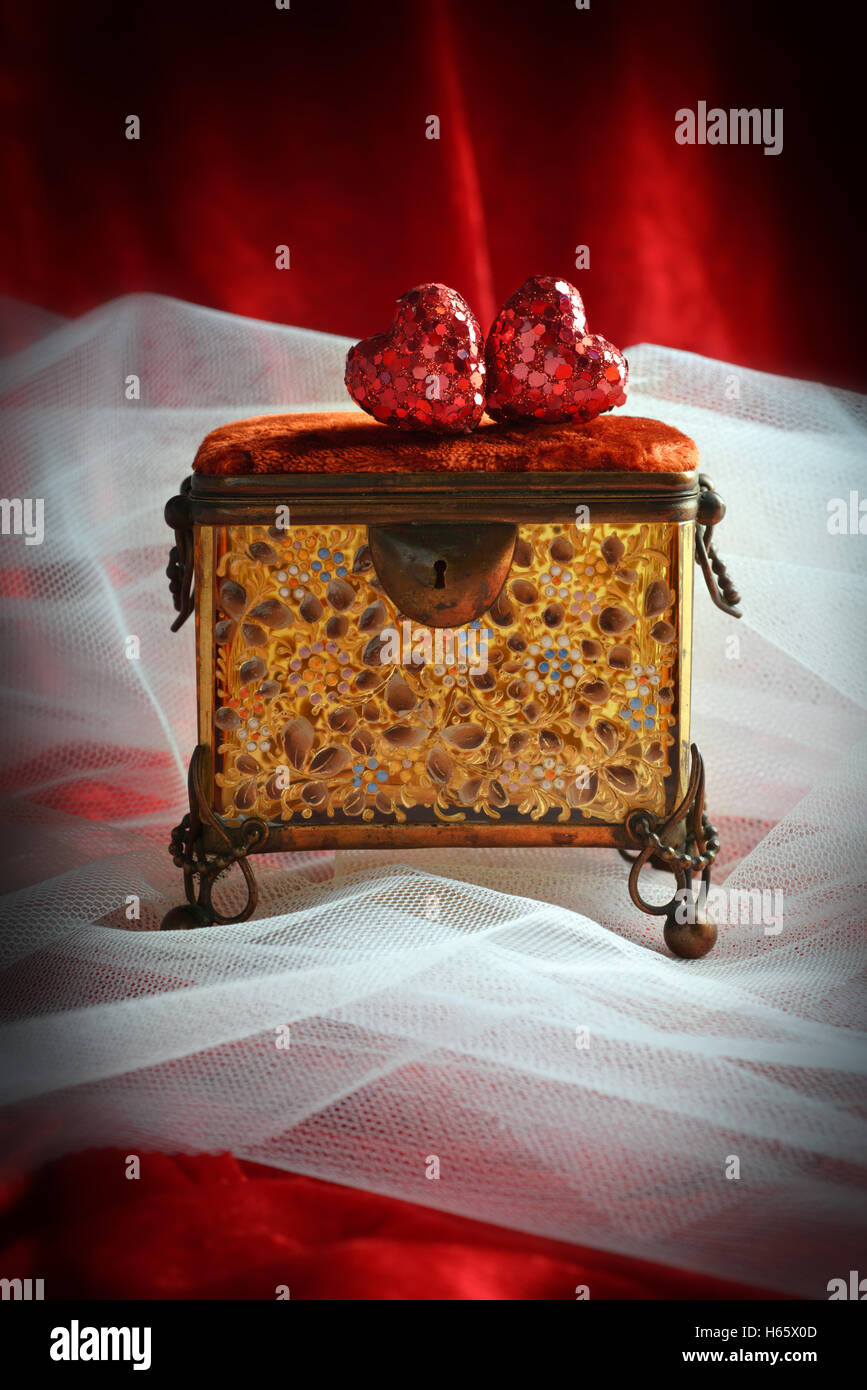 Antique jewellery casket with hearts and bridal veil Stock Photo - Alamy