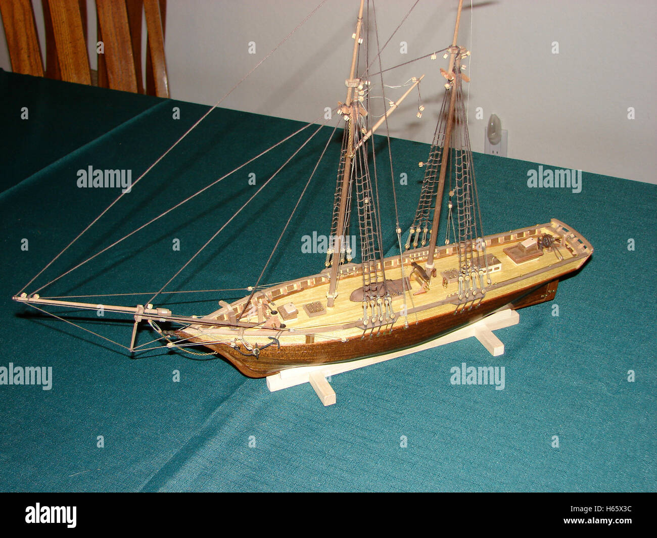 Wooden model ship fully rigged but without sails Stock Photo - Alamy