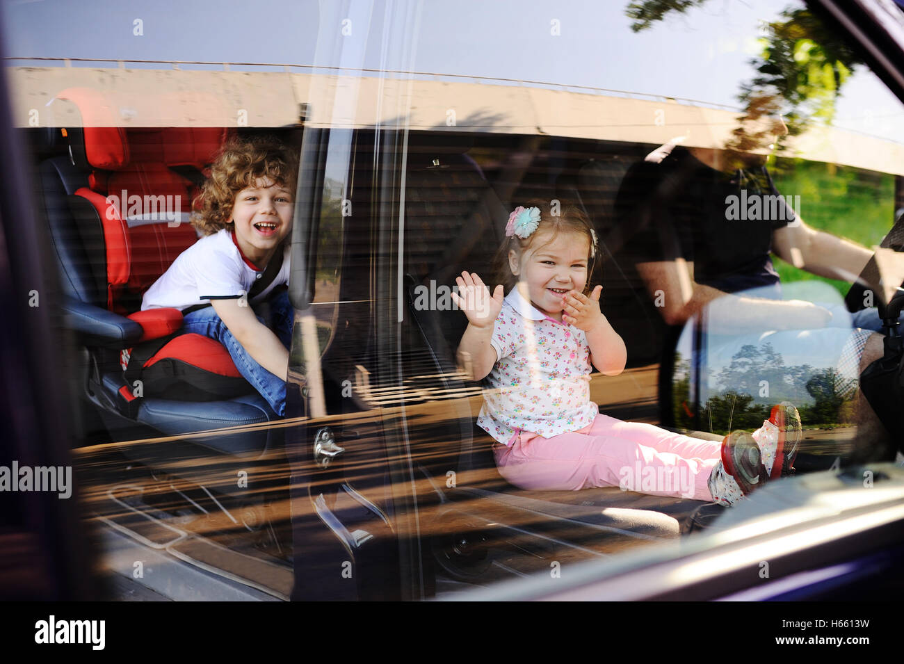 the family goes on a trip by minivan Stock Photo - Alamy