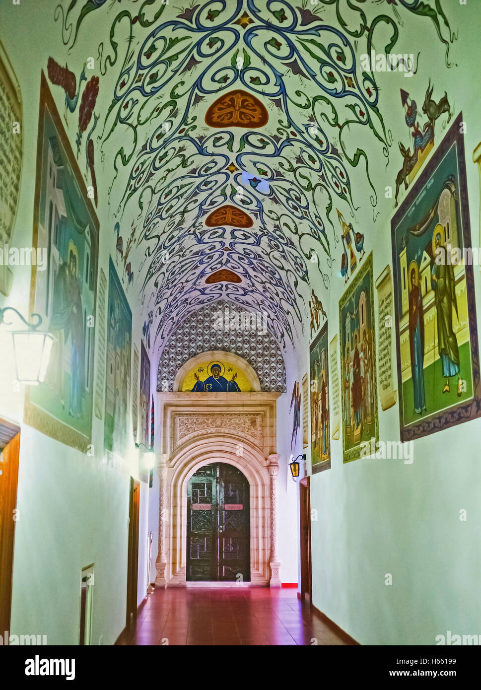 The scenic hall of the Kykkos Monastery with painted icons and nice ...