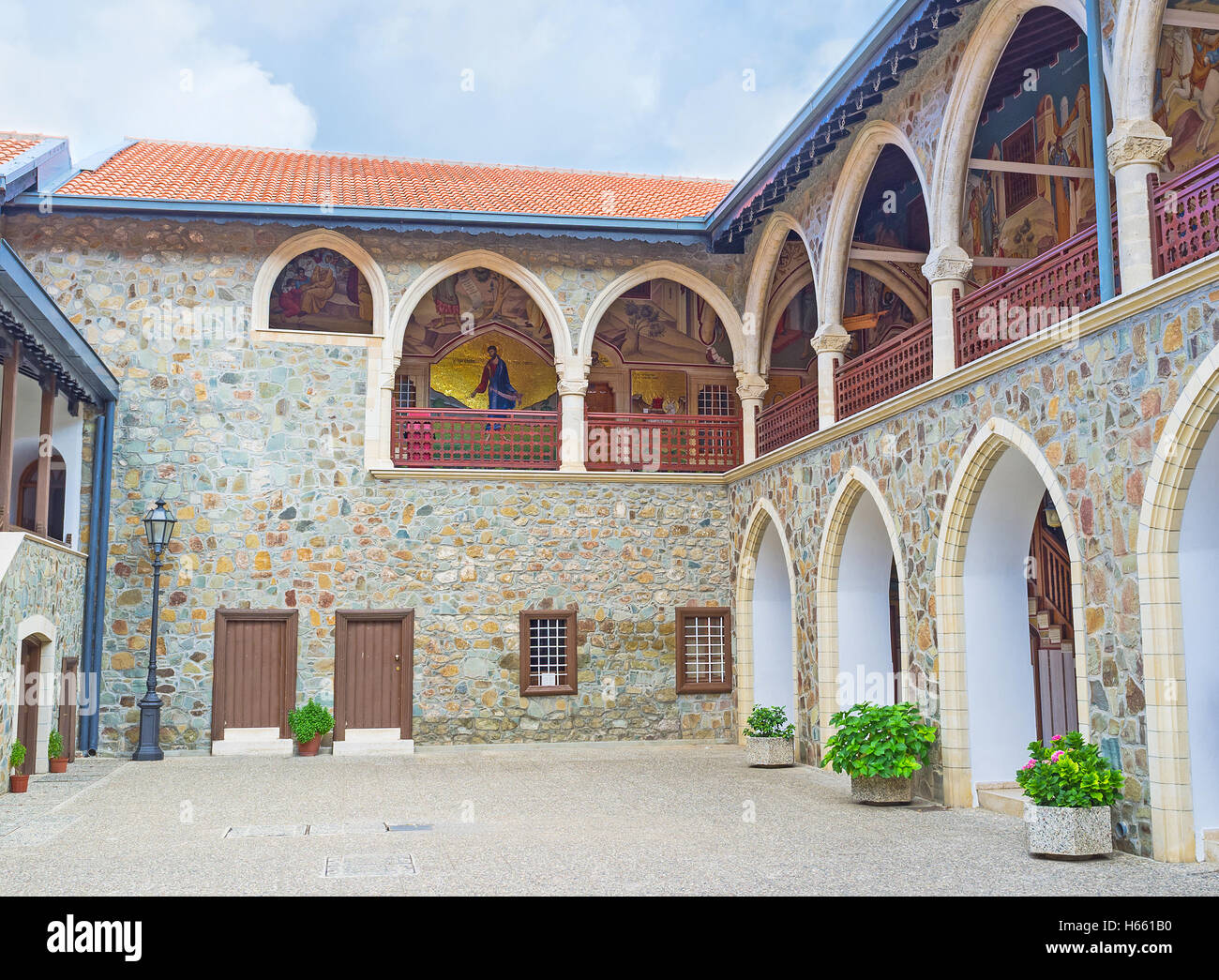 The courtyard of the Kykkos Monastery, decorated with the mosaic icons ...