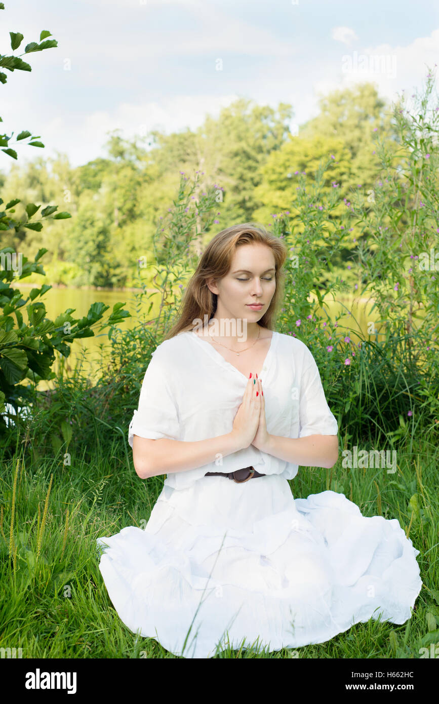 Yoga asanas in nature hi-res stock photography and images - Alamy