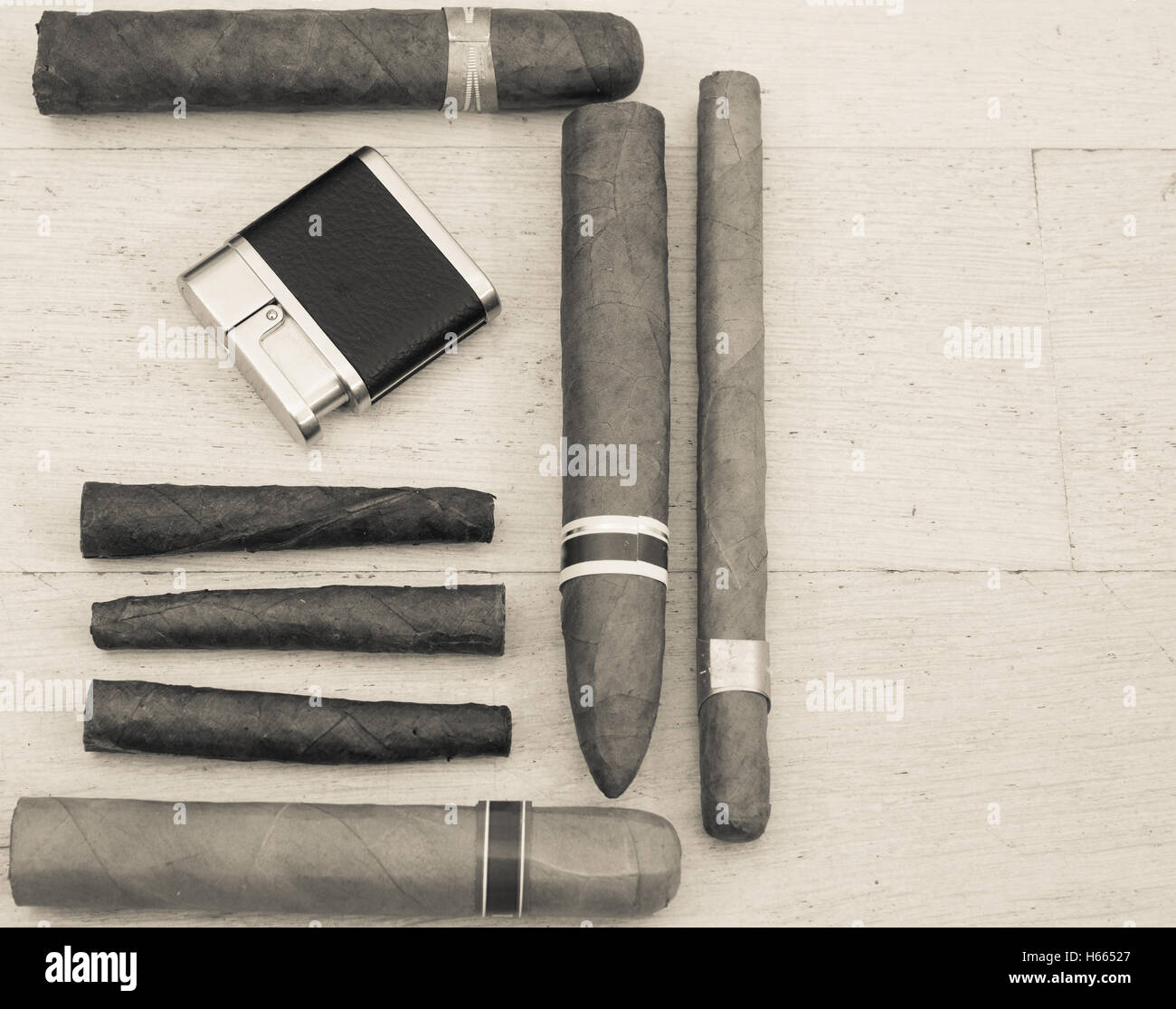 Lighter and cuban cigar on black hi-res stock photography and images ...