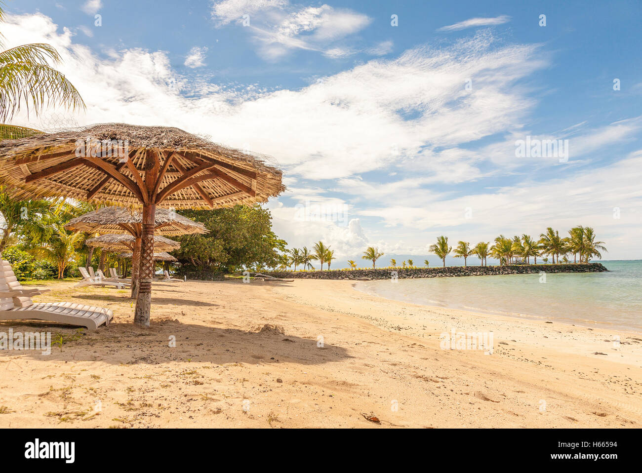 Relaxing at the beach in Samoa with beautiful sky Stock Photo - Alamy