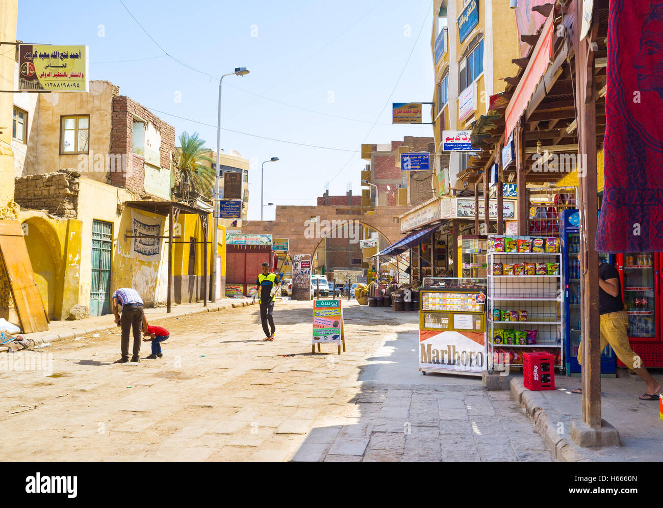 The long market street separated into the different parts by many old ...