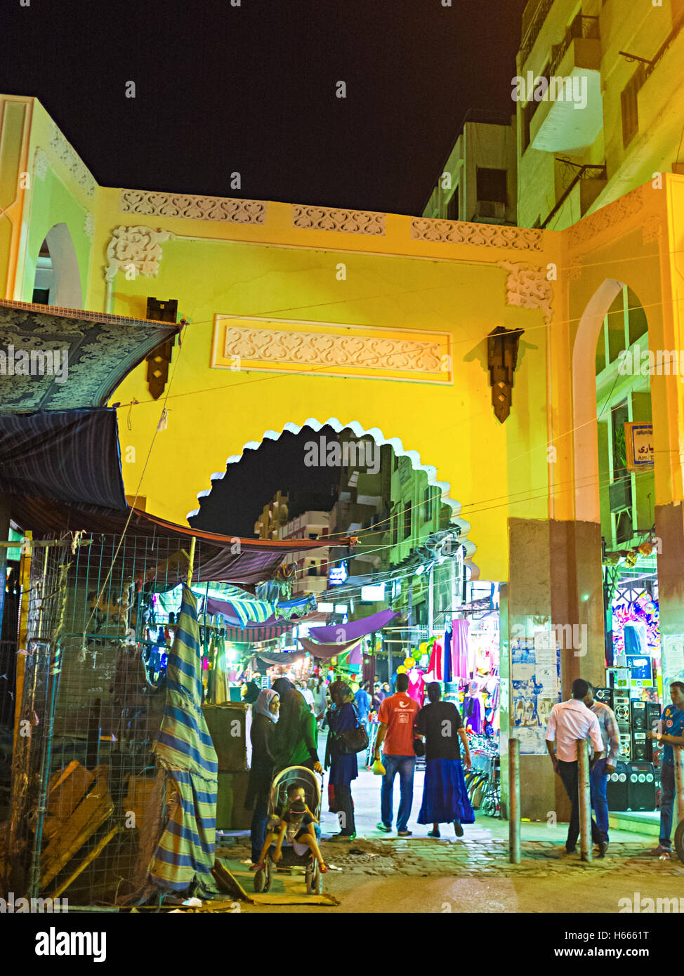The entrance to the old arabic market with the bright illuminated ...