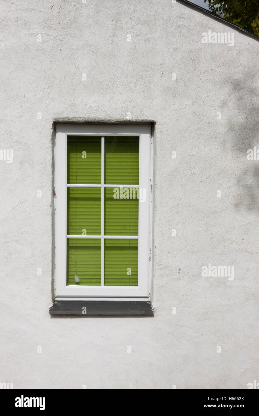 window with vibrant green blind Stock Photo - Alamy