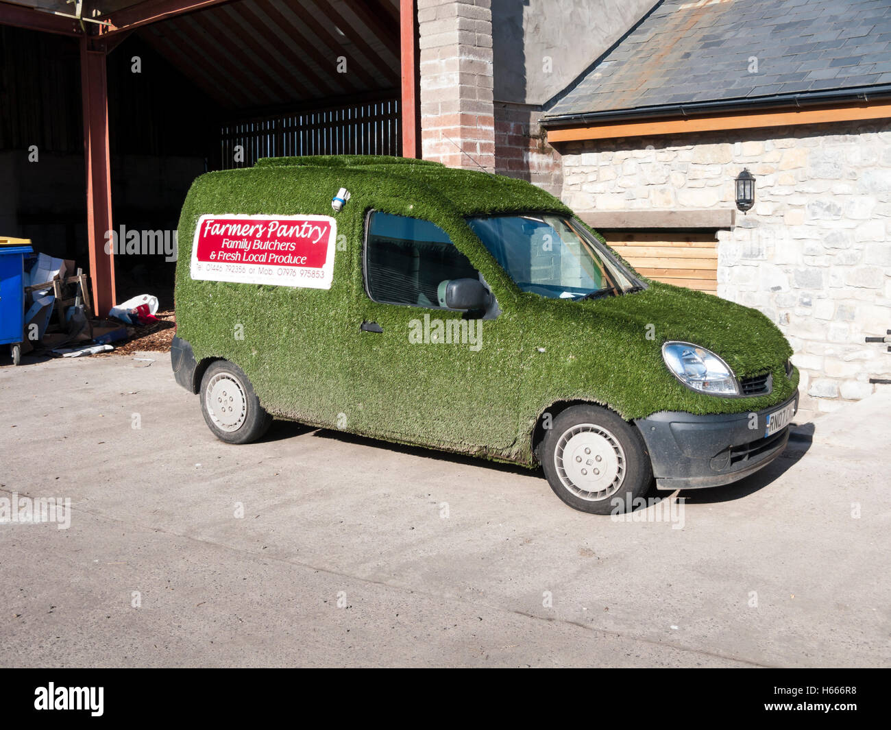 van covered in artificial grass Stock Photo - Alamy