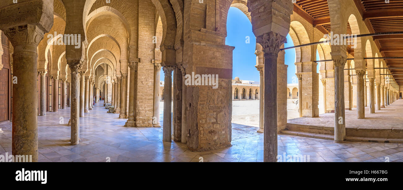 The medieval shady covered terrace of the Grand Mosque consists of many ...