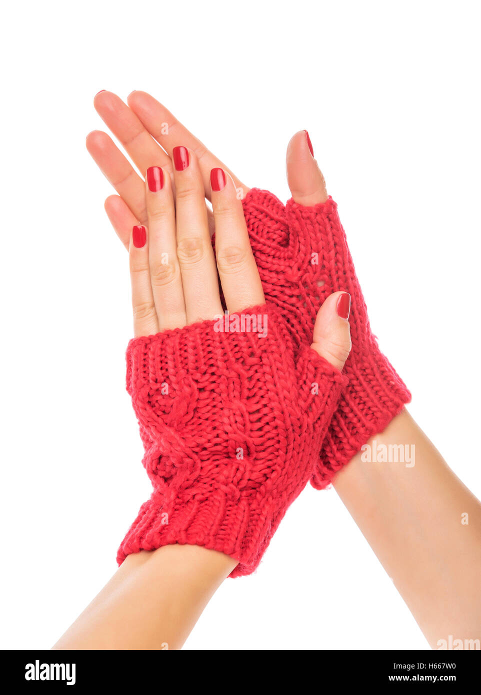 Female hands in mittens on a white background Stock Photo - Alamy