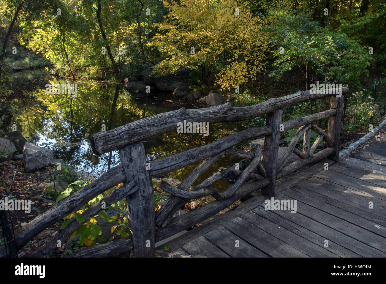 Landscape with a tiny wooden bridge Stock Photo - Alamy