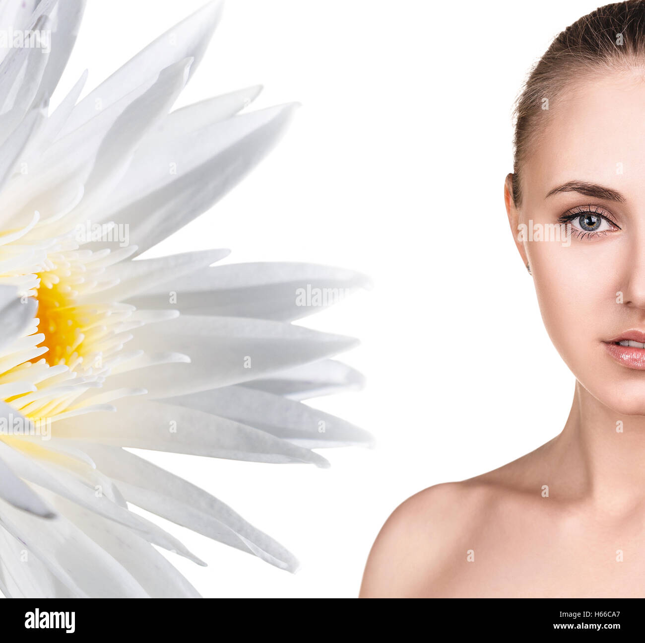 Beautiful woman half-face near white lotus flower. Beauty concept Stock ...