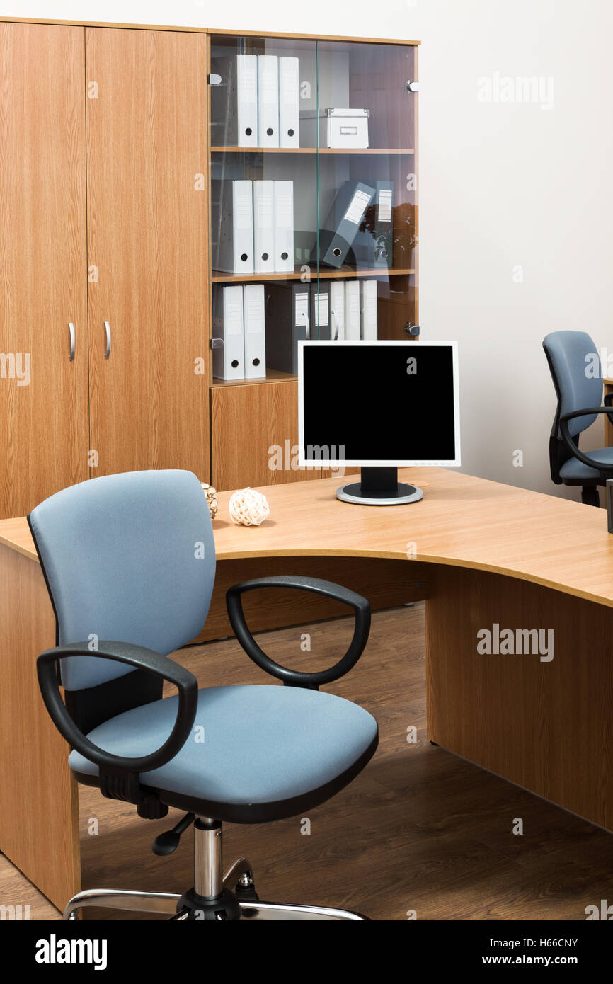 monitor on a desk in a modern office Stock Photo - Alamy