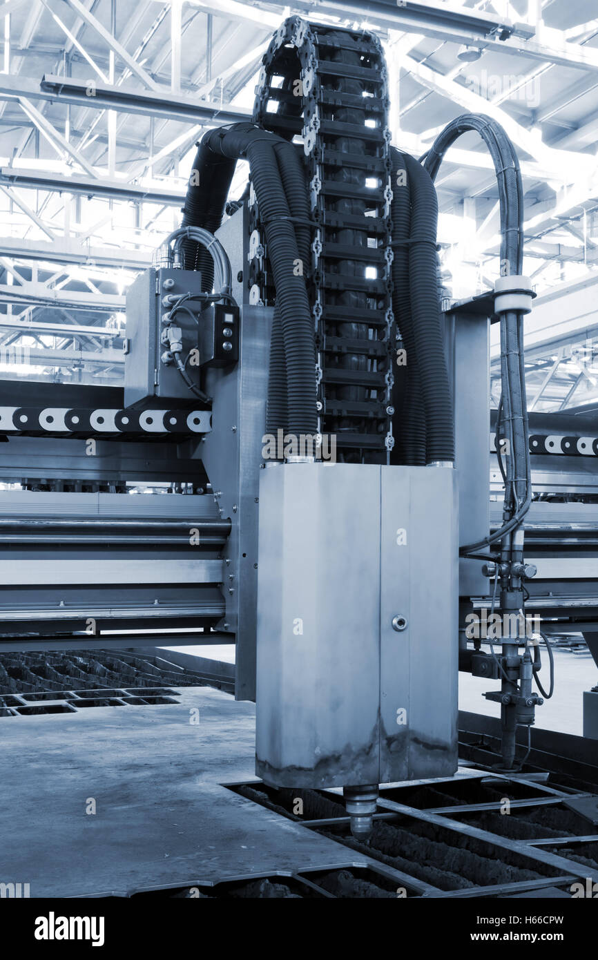 new and powerful metalworking machine in modern workshop Stock Photo ...