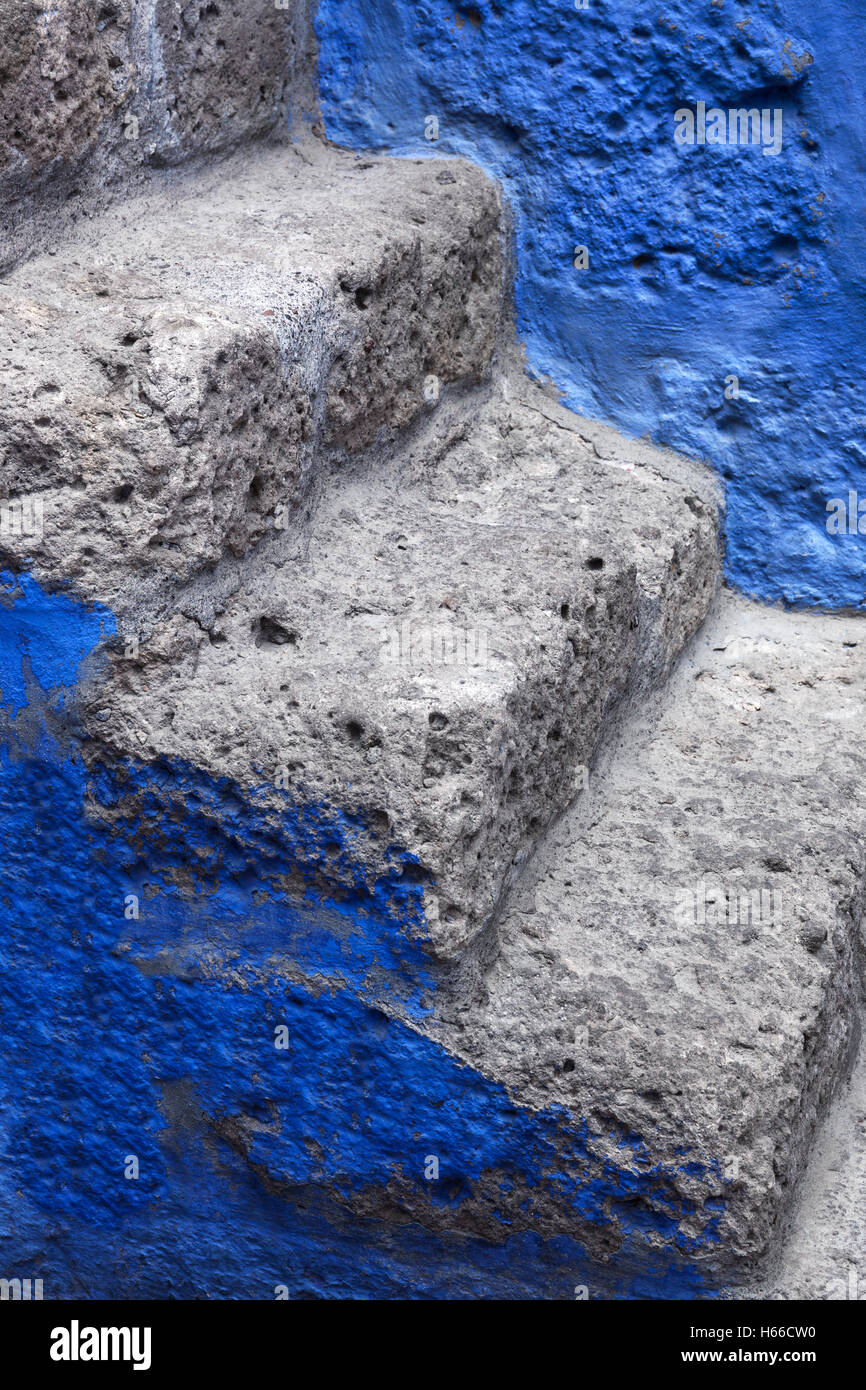 beautiful ancient steps and blue wall Stock Photo - Alamy
