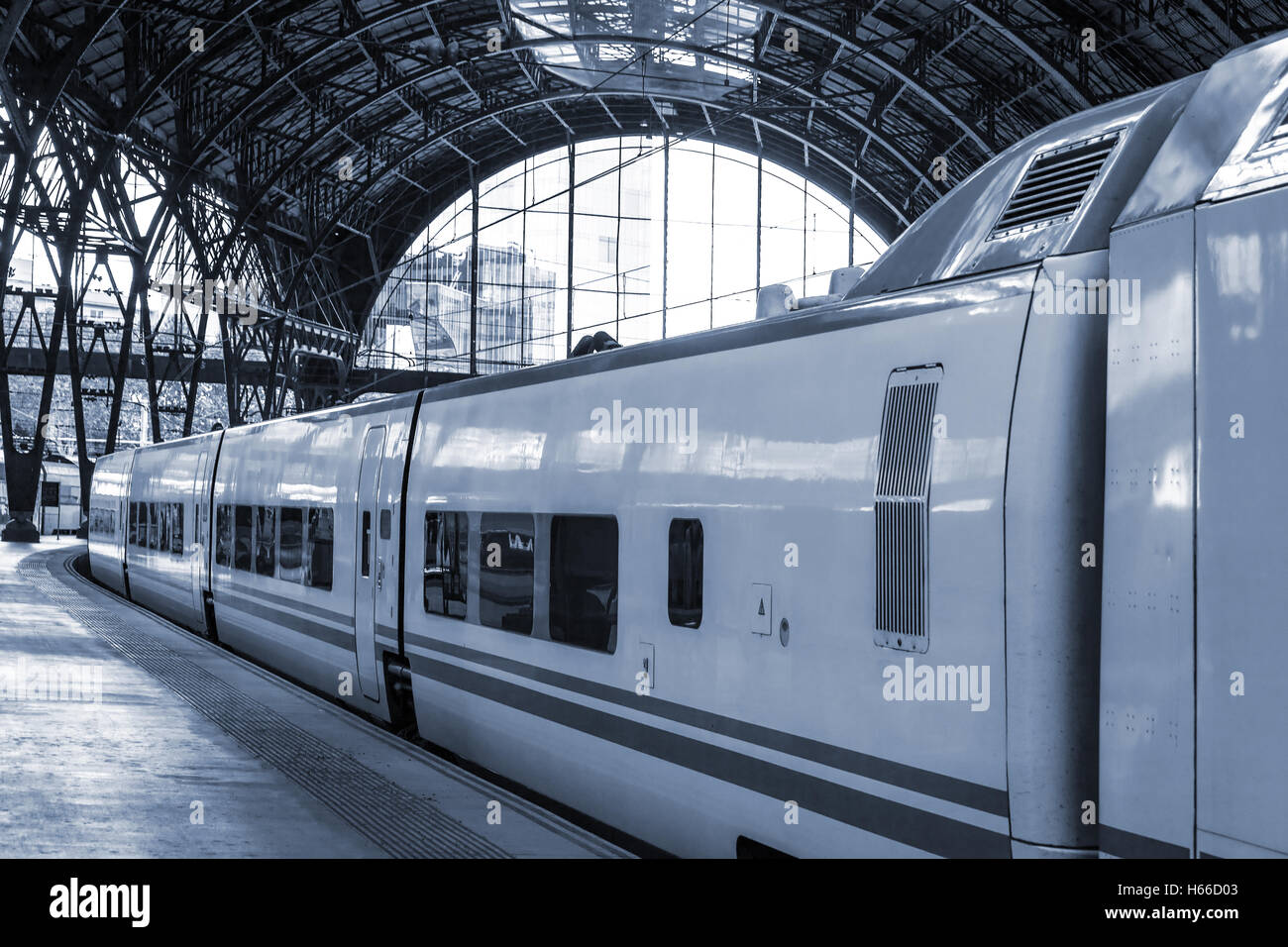 train cars on a modern train station Stock Photo - Alamy
