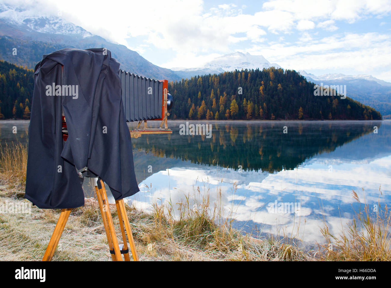 Medium format vintage film plate camera ready to photograph a landscape ...