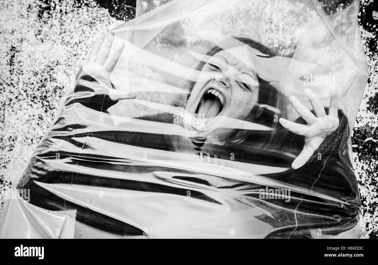 Woman trapped corpse bag, fear and violence Stock Photo - Alamy