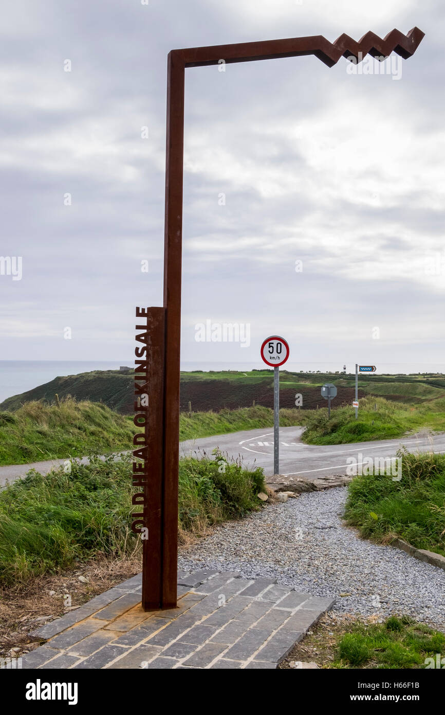 Rusted wrought iron marker sign at the Old Head of Kinsale, County Cork ...