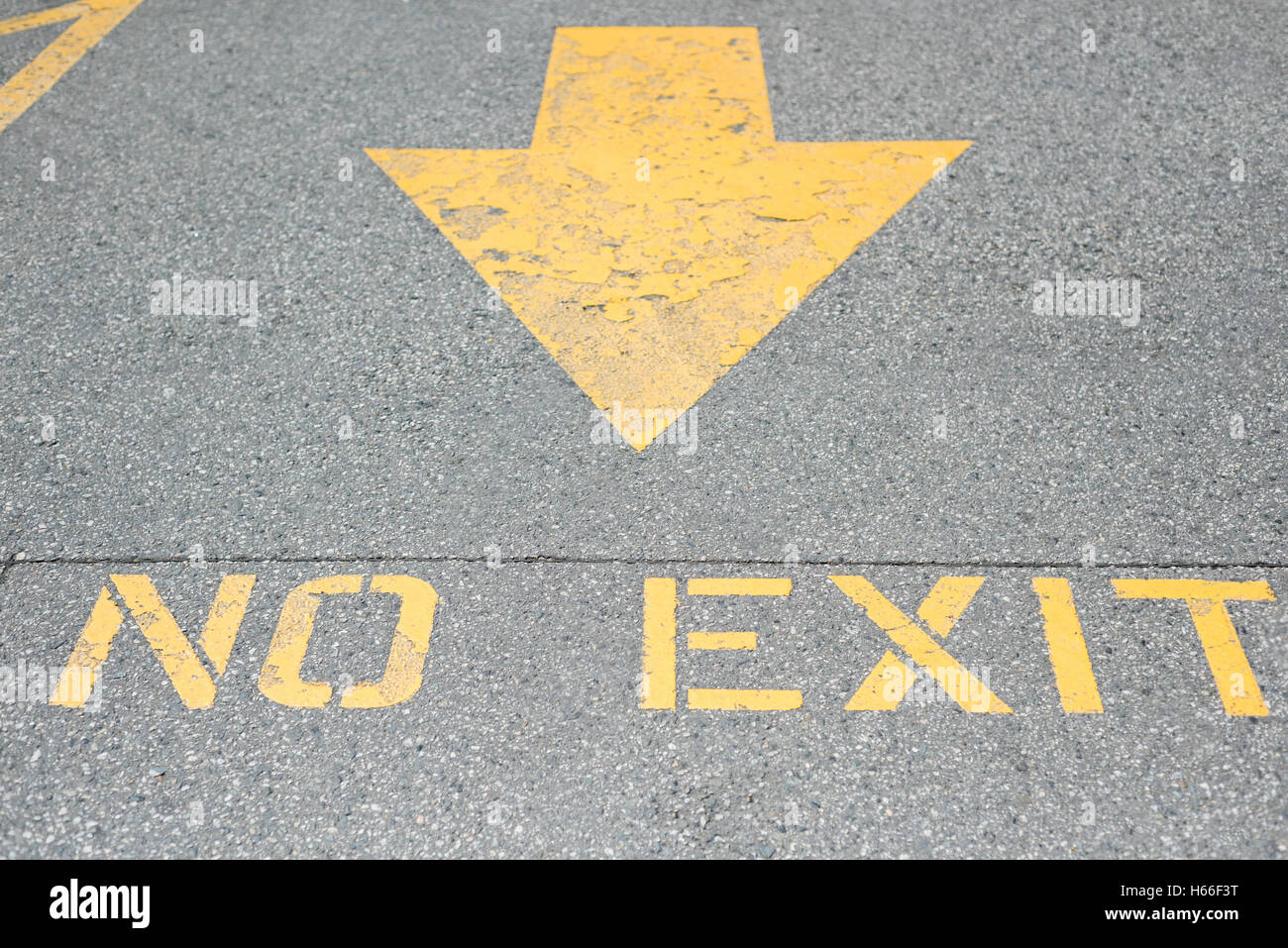 Arrow and no exit sign Stock Photo - Alamy