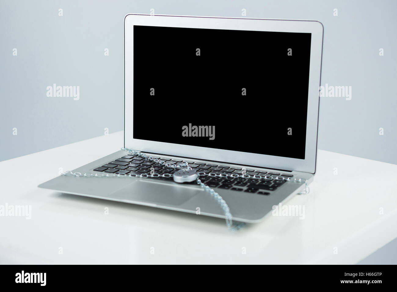 Close-up of locked laptop Stock Photo - Alamy