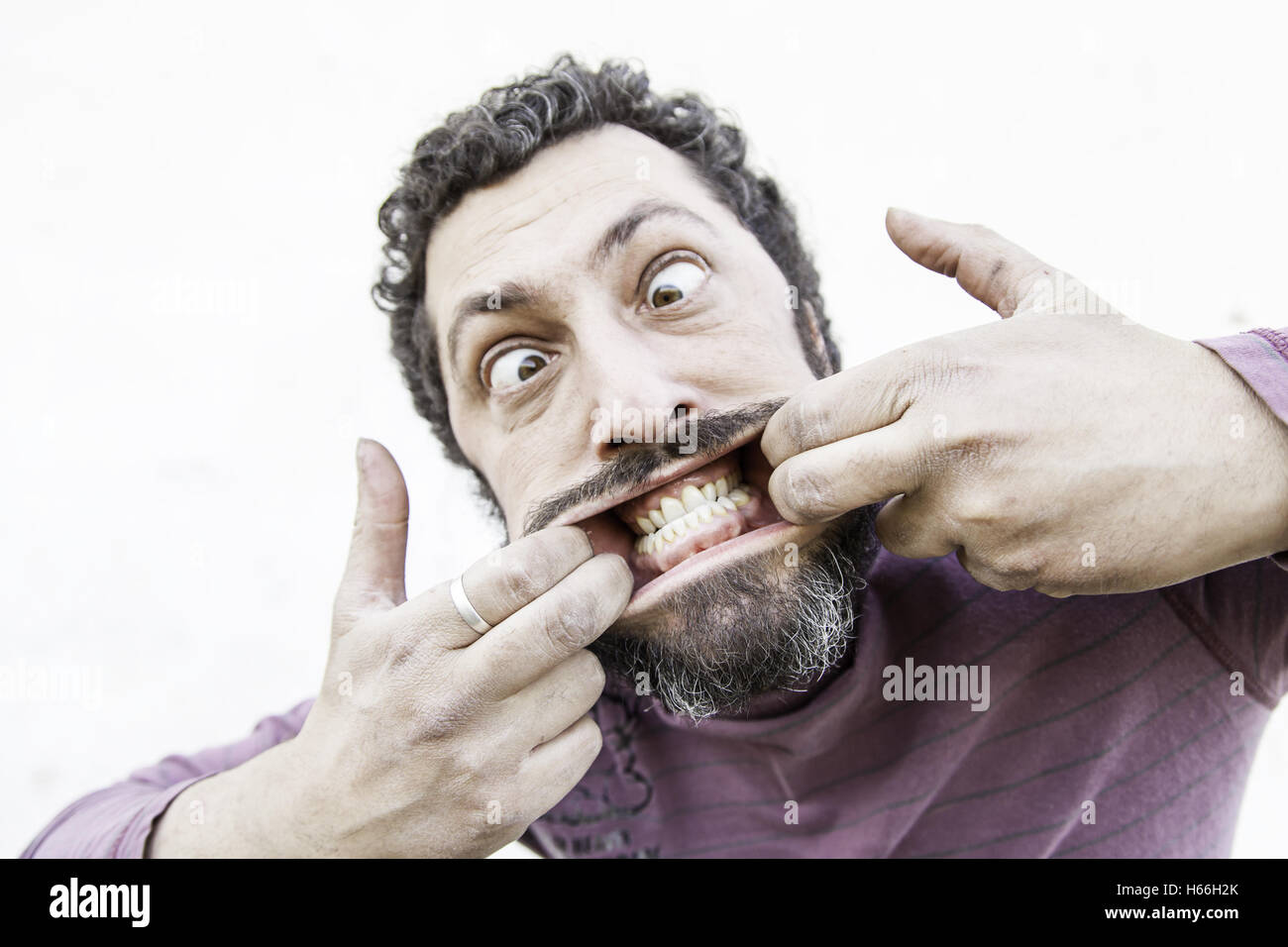 Man mocking and stressed, emotions Stock Photo - Alamy