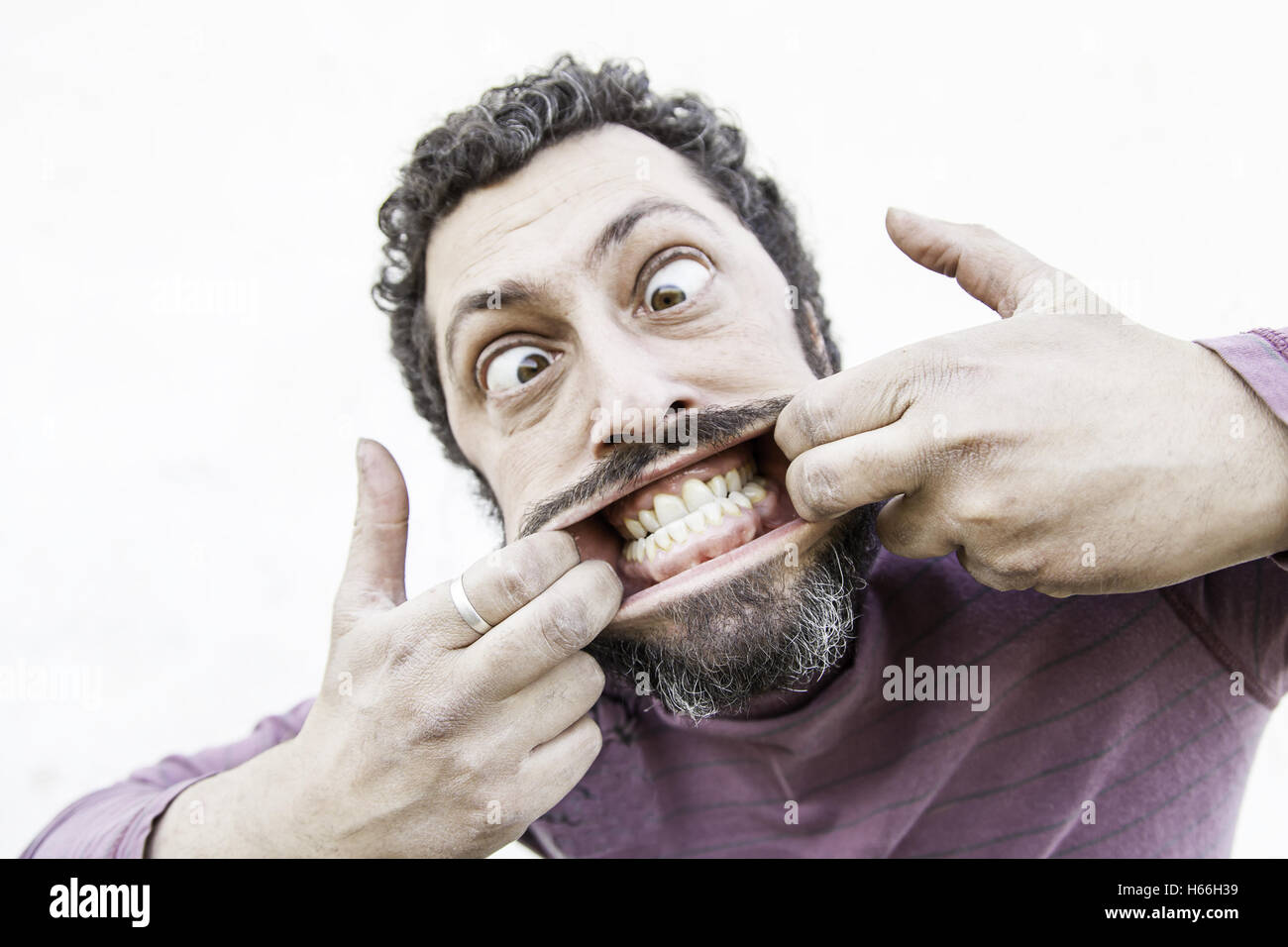Man mocking and stressed, emotions Stock Photo - Alamy
