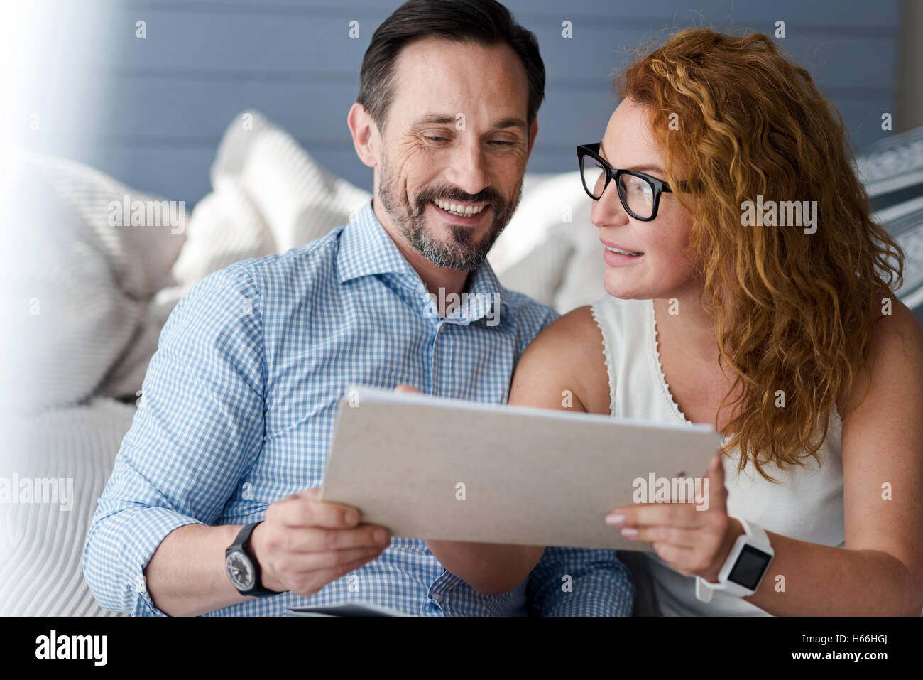 Business couple discussing important notes Stock Photo - Alamy