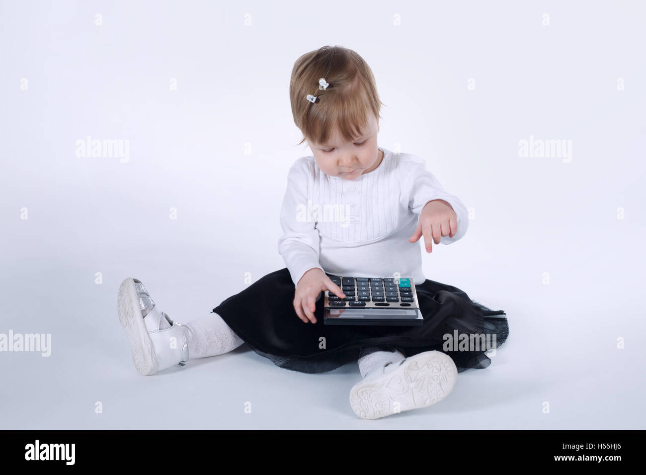 cute little girl with calculator Stock Photo - Alamy