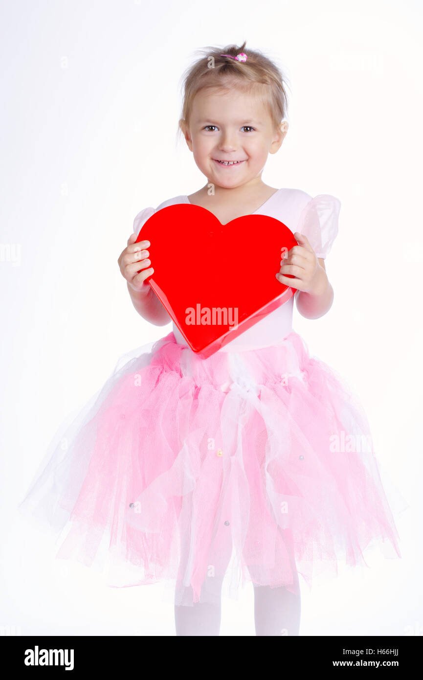 beautiful young girl with heart Stock Photo - Alamy