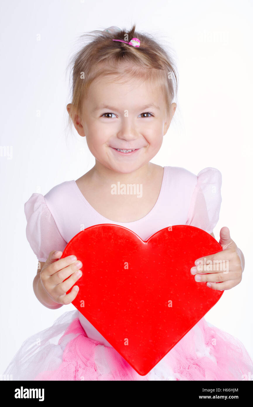 beautiful young girl with heart Stock Photo - Alamy