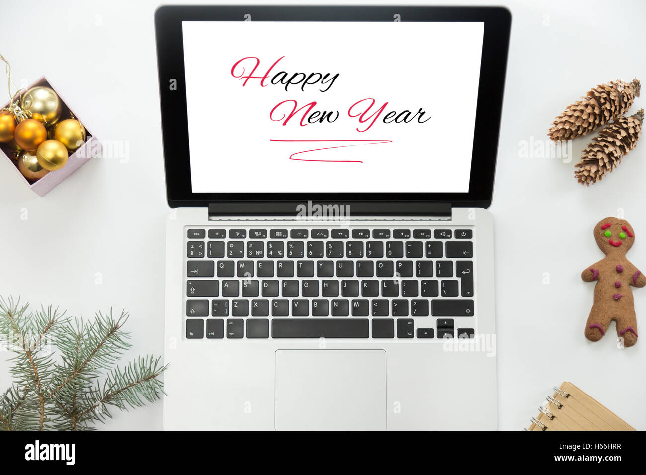 Flat view of an open laptop in the centre Happy new year decorat Stock ...