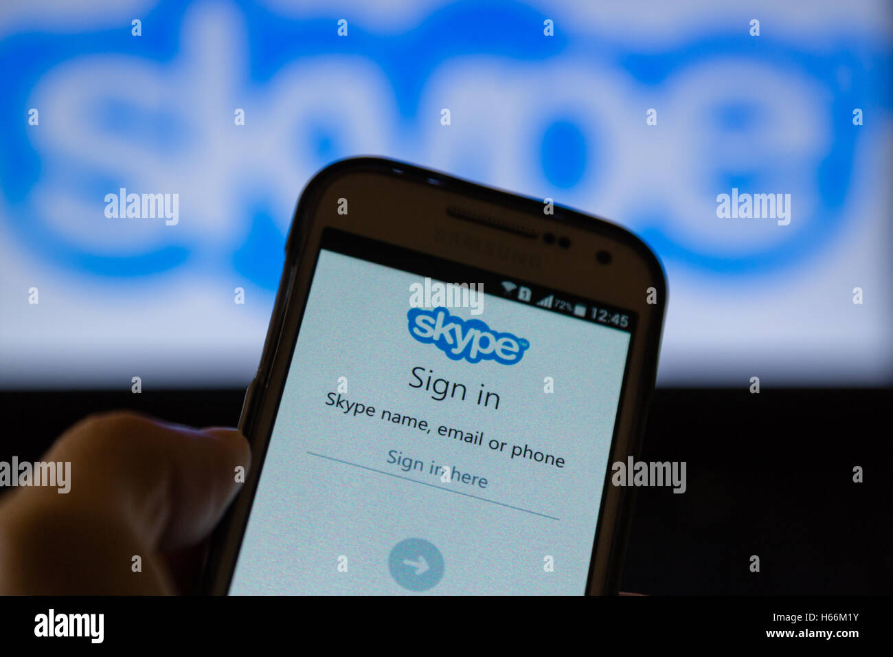A smartphone display shows Skype, an application that provides video ...
