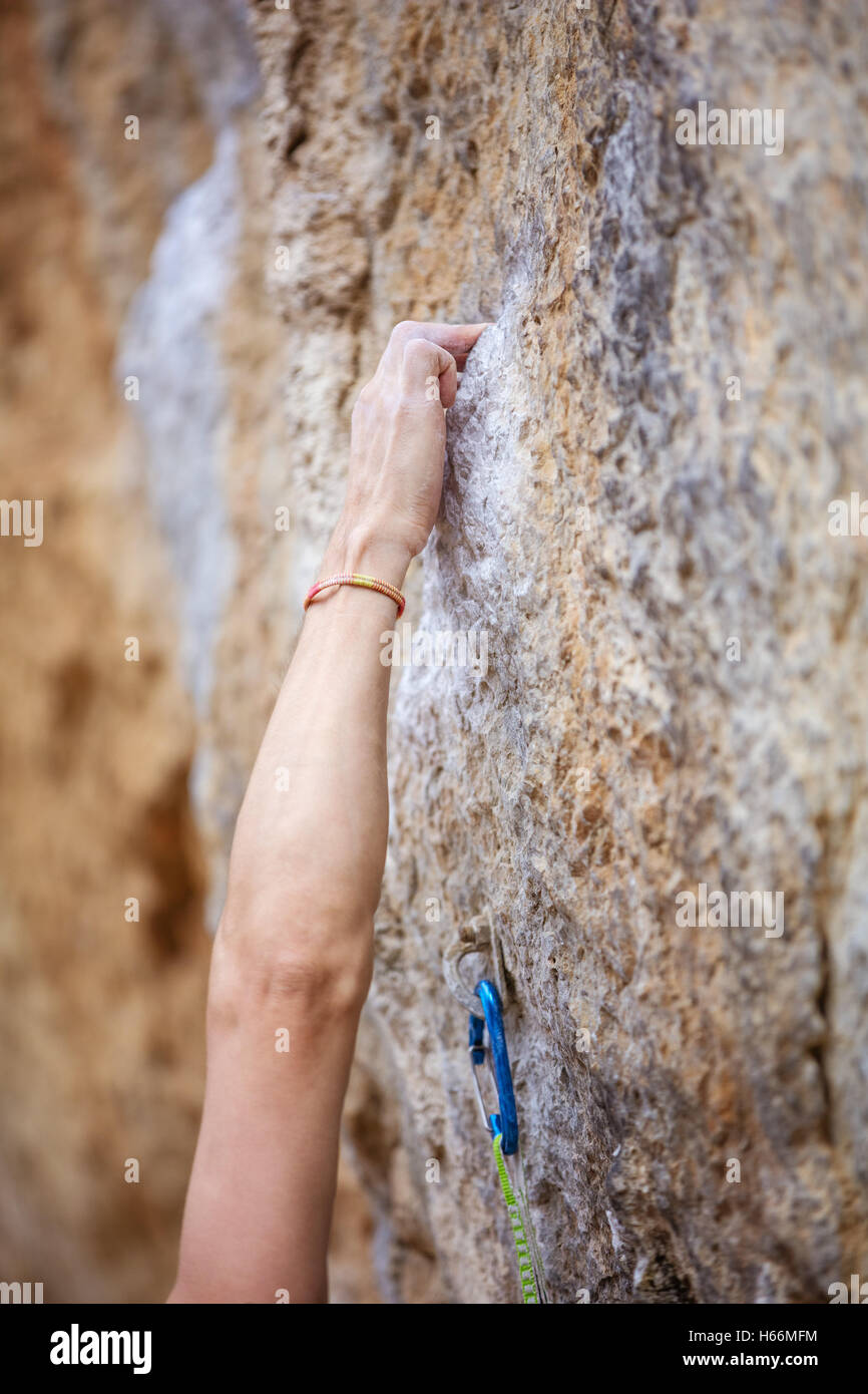 Cropped view of climber's hand on cliff Stock Photo - Alamy