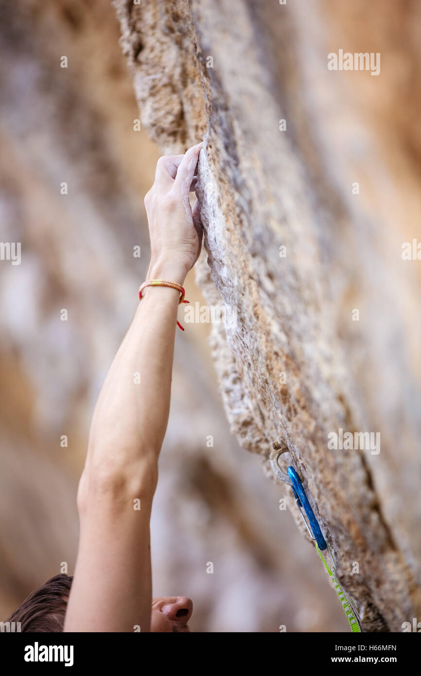 Cropped view of climber's hand on cliff Stock Photo - Alamy