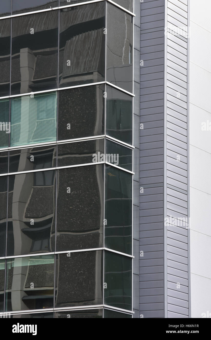 Reflections on glass panes of office building Stock Photo - Alamy