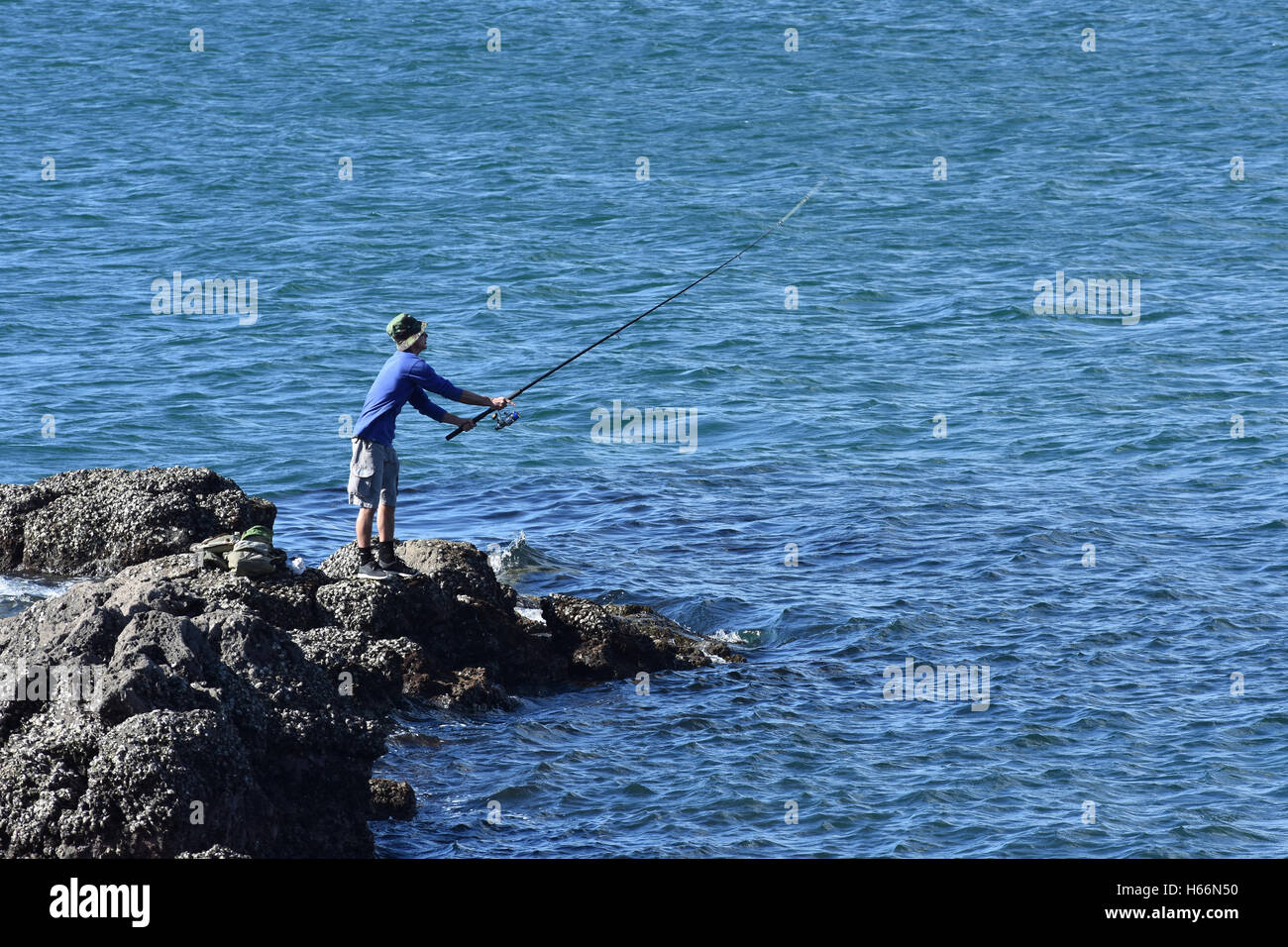 Risk rock fishing hi-res stock photography and images - Alamy