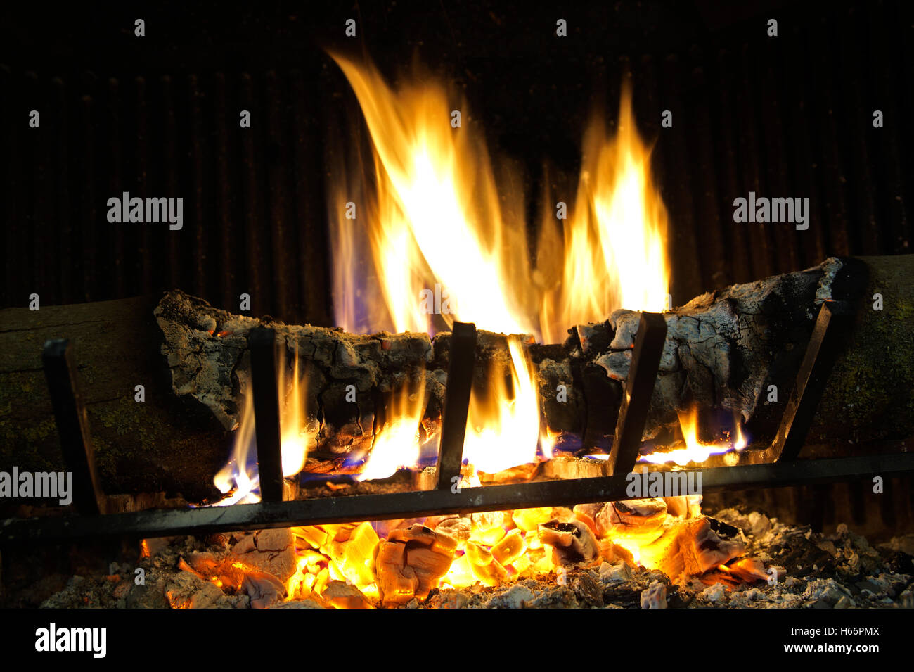Fire burning in fireplace home hi-res stock photography and images - Alamy