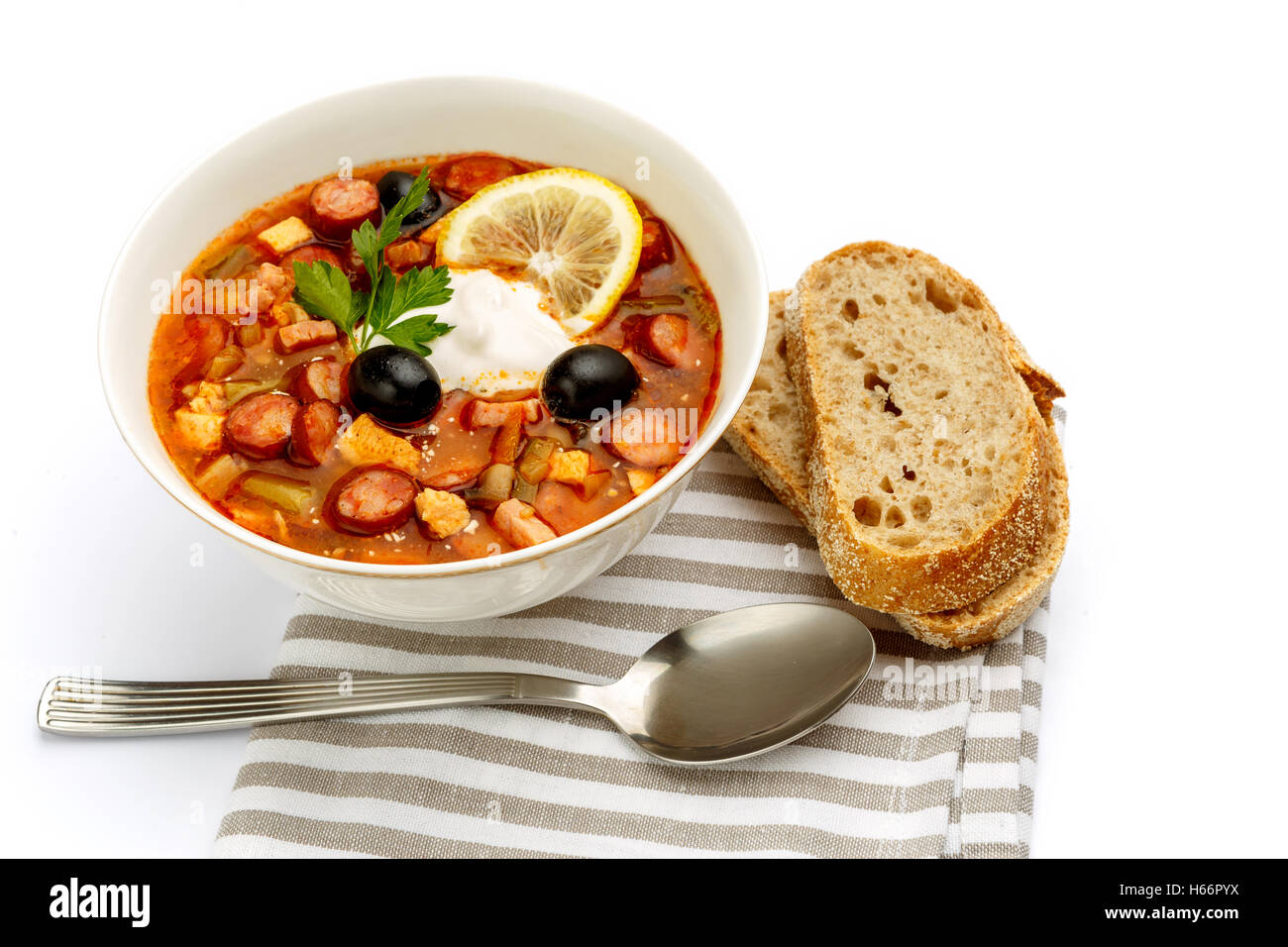 Solyanka - Russian traditional meat soup on white background Stock ...
