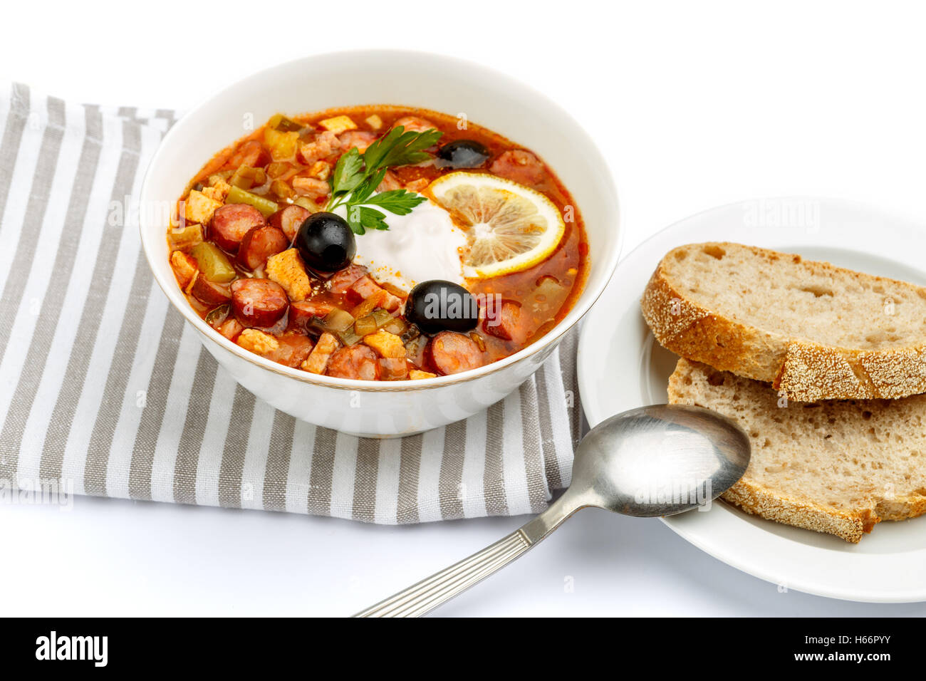 Solyanka - Russian traditional meat soup on white background Stock ...