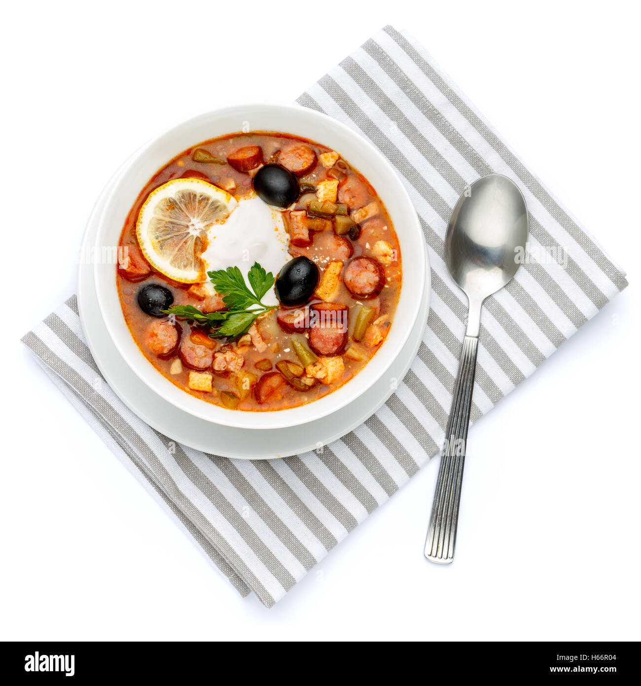 Solyanka - Russian traditional meat soup on white background Stock ...
