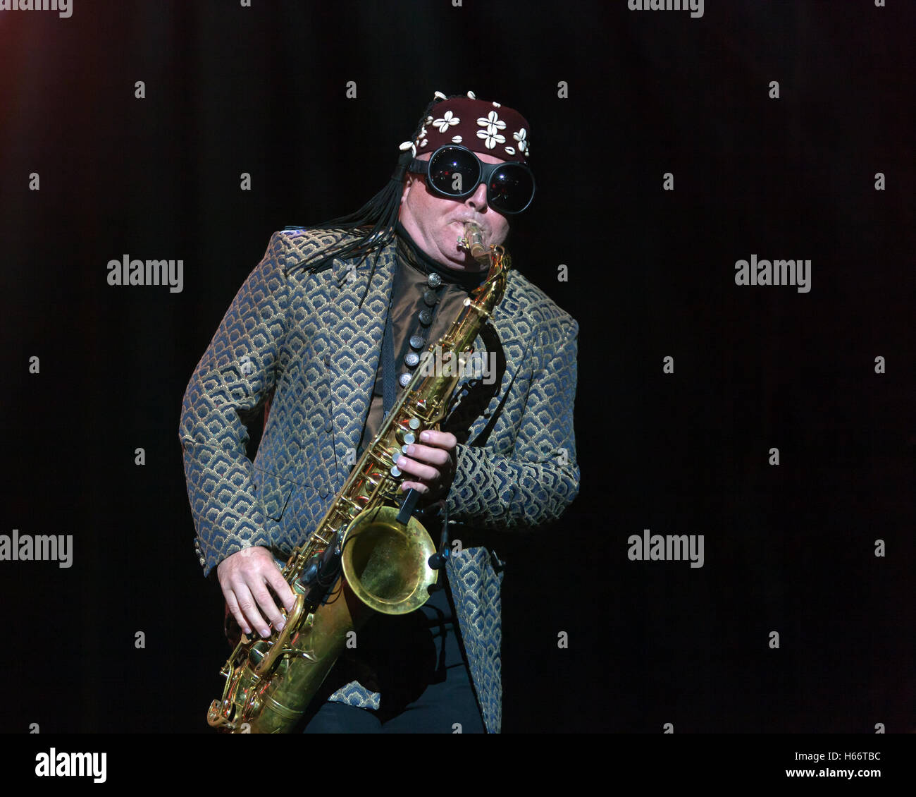 Lee Jay Thompson performing with Madness on the main stage at the On ...