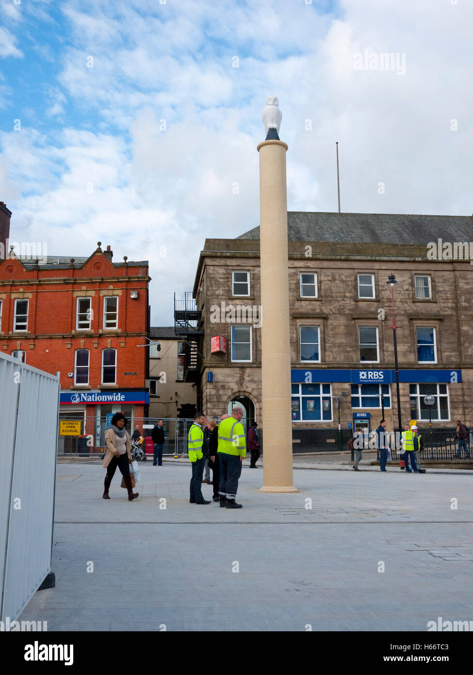 Tall stone column with the Oldham Owl symbol on top, Oldham, Greater ...